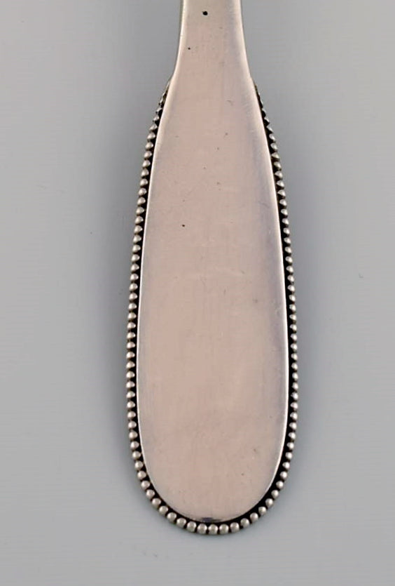 Evald Nielsen number 14 tablespoon in hammered silver (830). 1920s. – L ...