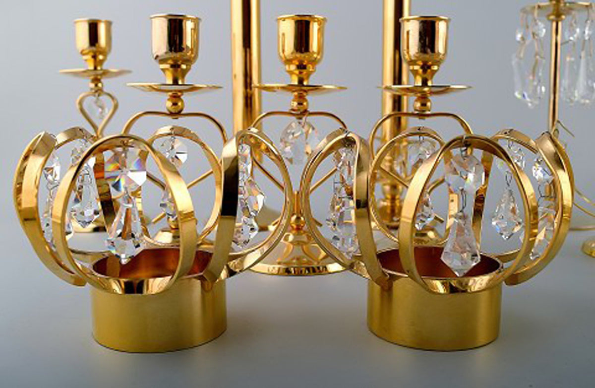 28 candlesticks in gilded metal for lights and tea lights in Swarovski ...