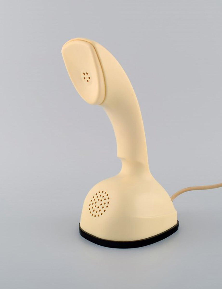 Ericsson Cobra phone in cream-colored plastic with turntable at the bo ...