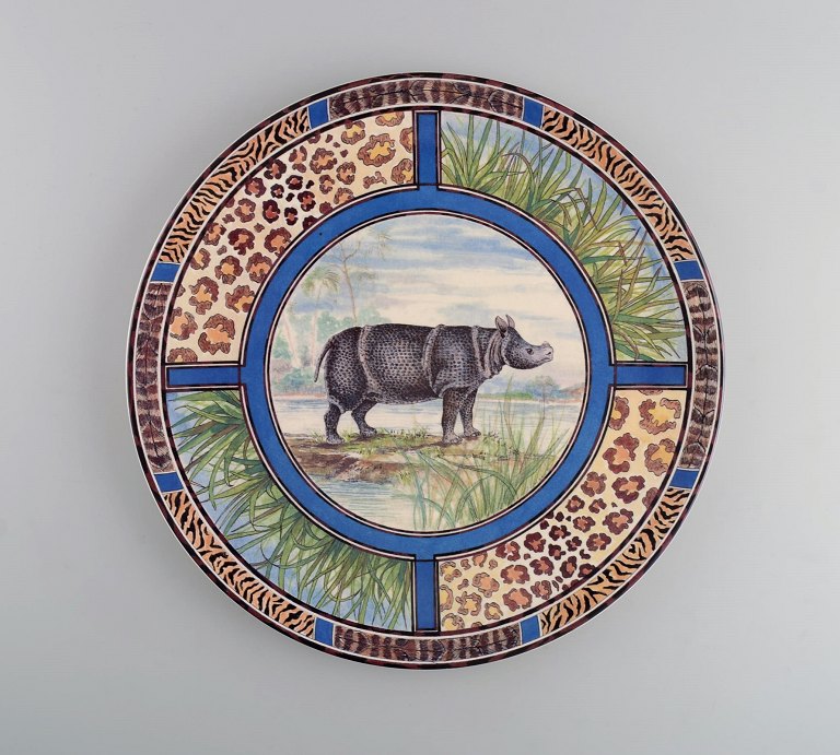 Gien, France. Large Savane porcelain dish with hand-painted rhinoceros ...