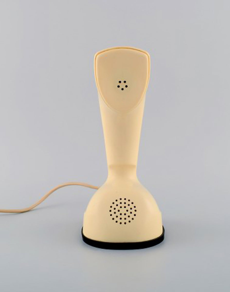 Ericsson Cobra phone in cream-colored plastic with turntable at the bo ...
