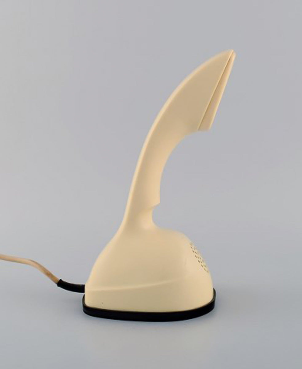 Ericsson Cobra phone in cream-colored plastic with turntable at the bo ...