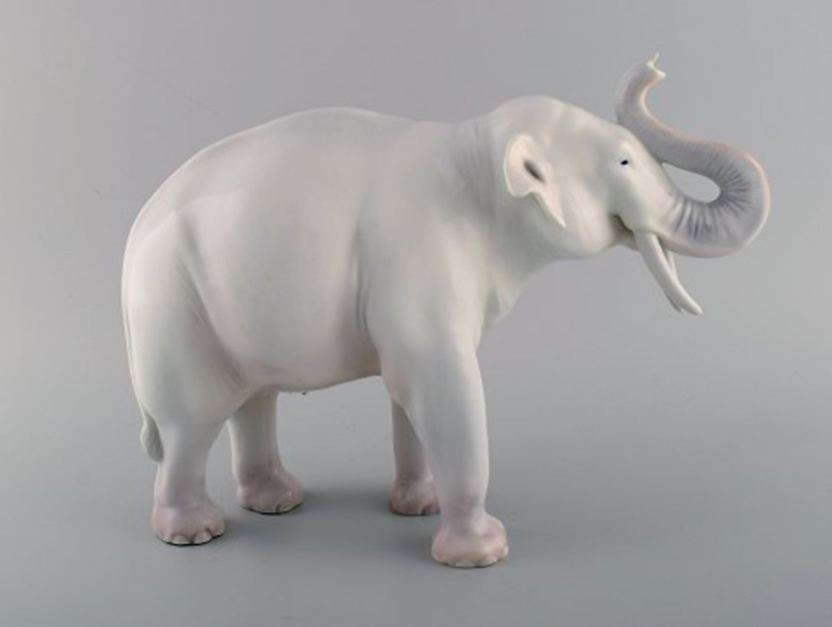 Axel Locher for Royal Copenhagen. Large and rare porcelain figure. Ele ...