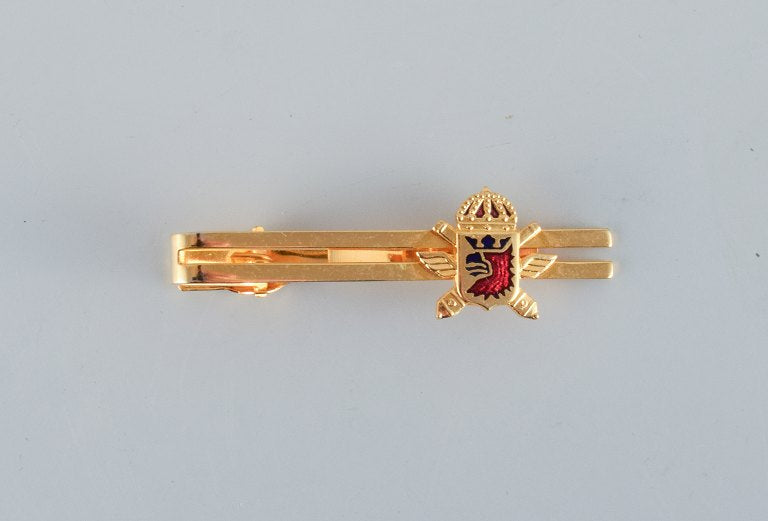 A collection of ten Danish tie pins in sterling silver and gold-plated ...
